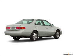 2000 Toyota Camry LE V6, Rear 3/4 angle, Yellow